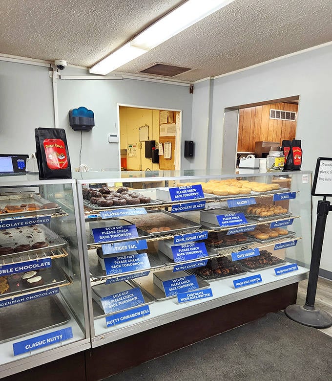 Inside, the no-frills interior keeps the focus where it belongs &ndash; on the spectacular array of freshly made donuts awaiting your selection.