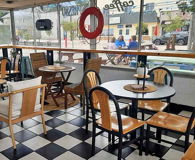 Interior: Black and white checkered floors meet nautical charm in this cozy haven. The life preserver isn't just decoration &ndash; it's for saving you from ordinary breakfast.