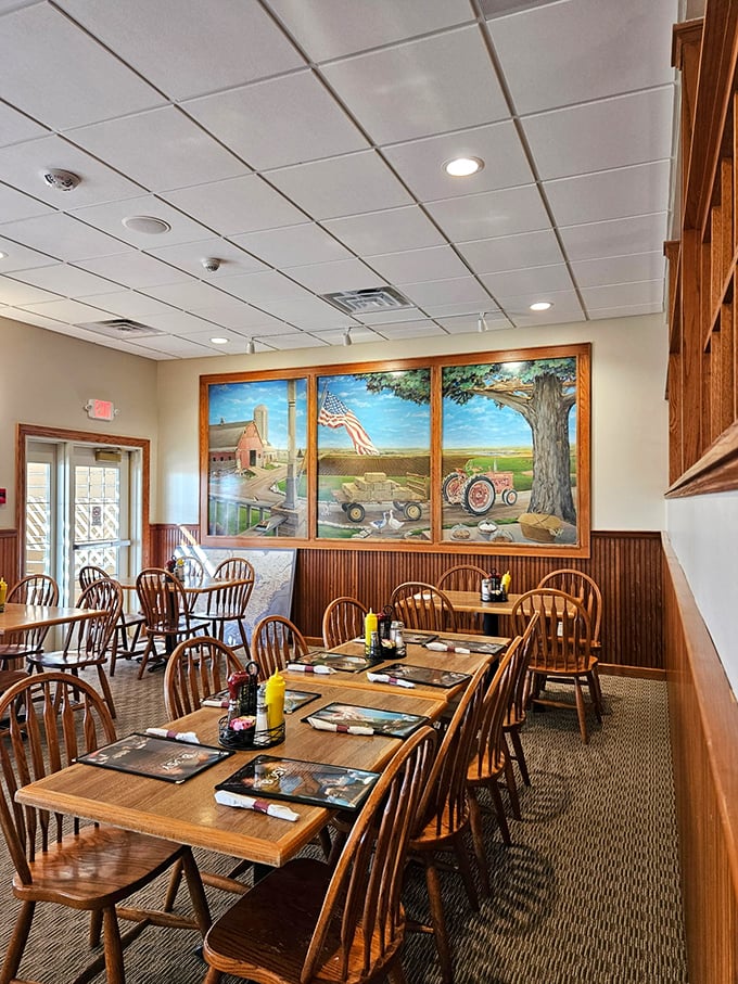 Country charm meets comfort dining in this warm interior, where wooden tables await the feast to come.