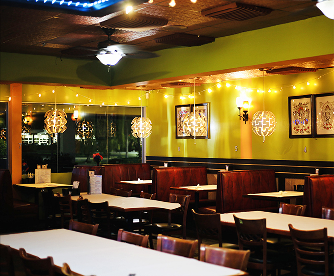 Lime-green walls and golden pendant lights create an atmosphere that says "you're not in Kansas anymore" &ndash; in the best possible way.