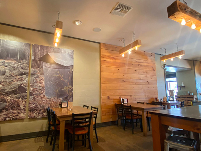 Rustic wooden walls and warm lighting create the perfect backdrop for biscuit-based revelations, like dining in a Pinterest board that actually delivers.