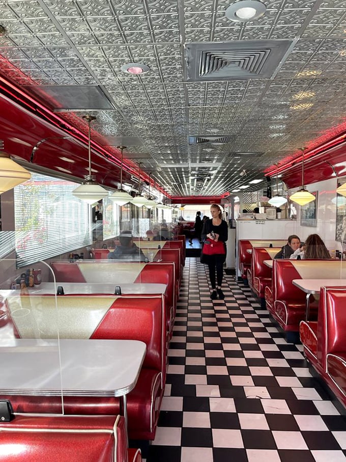 Red vinyl booths, checkered floors, and that gorgeous tin ceiling &ndash; walking into Georgie's feels like stepping straight into 1962.