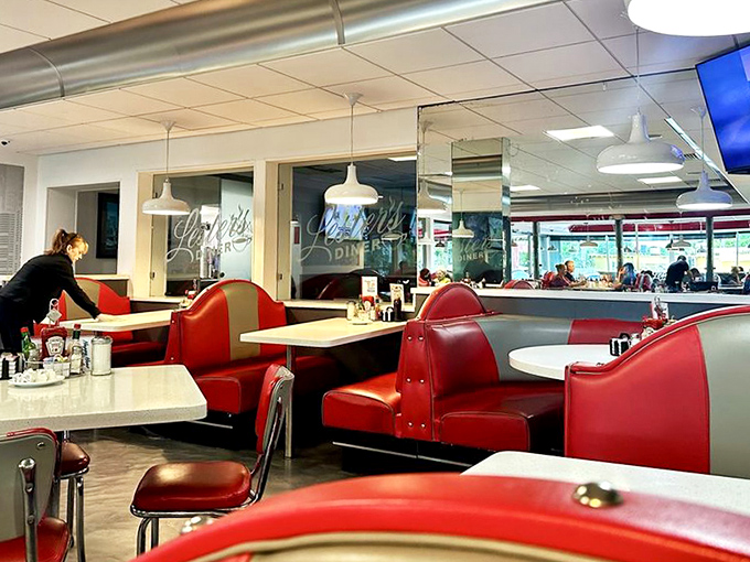 Classic red vinyl booths and chrome accents transport diners back to a time when conversations happened face-to-face and coffee refills were automatic.