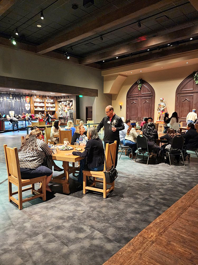 Inside the great hall, wooden tables await hungry guests while servers in period costume prepare to transport diners to a bygone era.