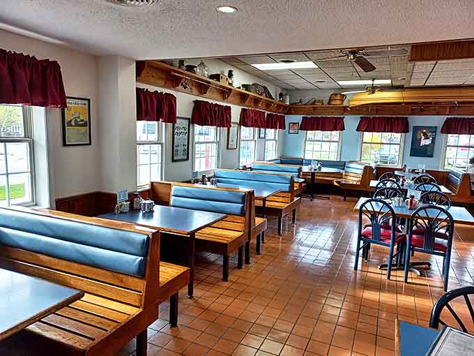 Comfortable blue booths and wooden tables create the perfect setting for enjoying classic American comfort food without pretension or fuss.
