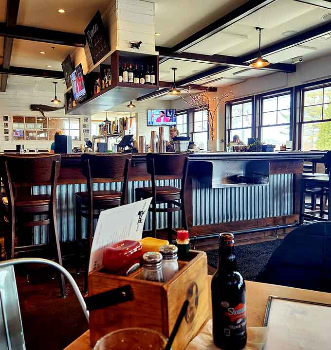 The warm, inviting interior strikes that perfect balance between neighborhood bar and quality restaurant that actually knows what it's doing.