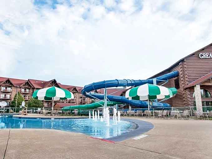 The outdoor splash zone beckons on sunny days, proving Great Wolf Lodge isn't just an indoor affair. Those green-and-white umbrellas practically scream "vacation mode activated!"