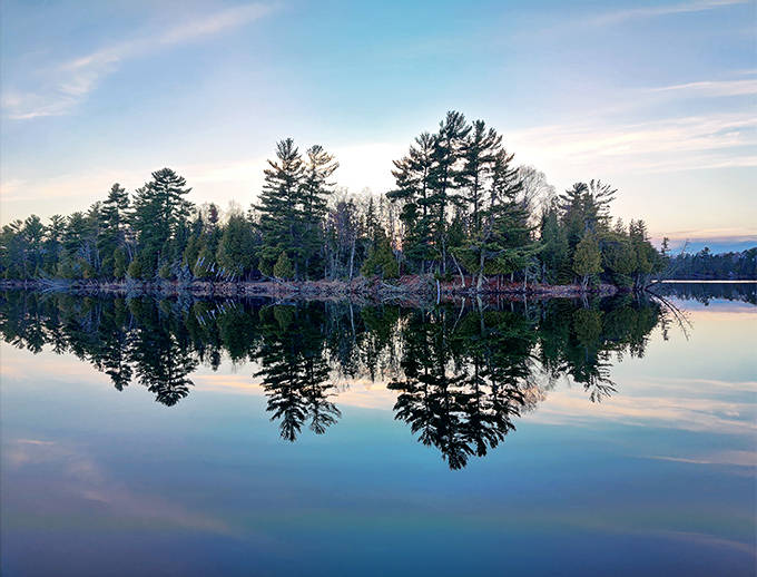 Mirror, mirror on the lake &ndash; Bear Head's still waters create perfect reflections that'll have you questioning which way is up.