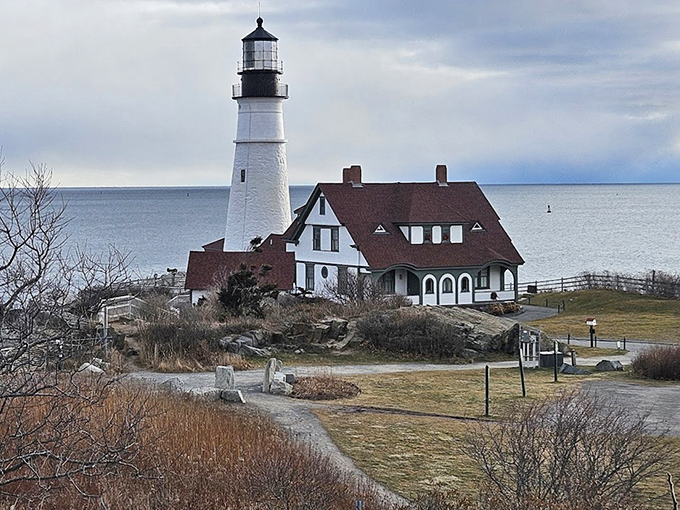 The lighthouse commands attention from across the bay, its classic New England architecture a testament to both form and function.