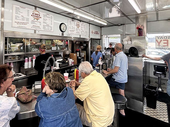 Inside, the counter seating offers front-row tickets to the sizzle show, where burger magic happens before your eyes.