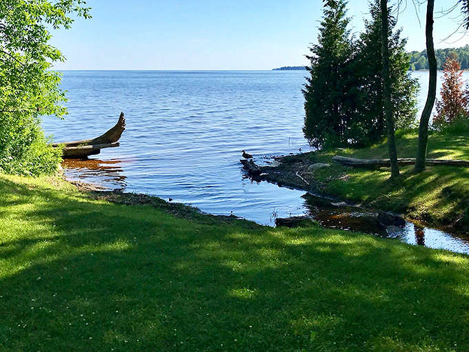 Mother Nature's infinity pool &ndash; where Lake Michigan's waters meet the sky in a seamless blend of blues.