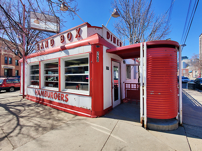 The iconic Band Box Diner's compact red and white structure stands as a Minneapolis landmark, serving up burgers that locals line up for.