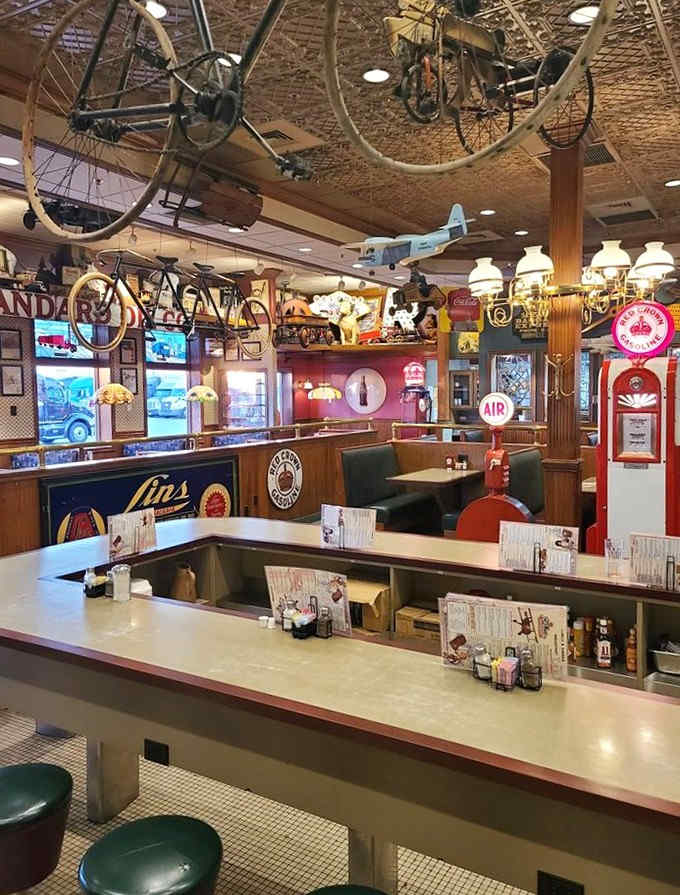 Step back in time at RPlace where vintage gas pumps, bicycles, and nostalgic memorabilia create a museum-like atmosphere for comfort food lovers.