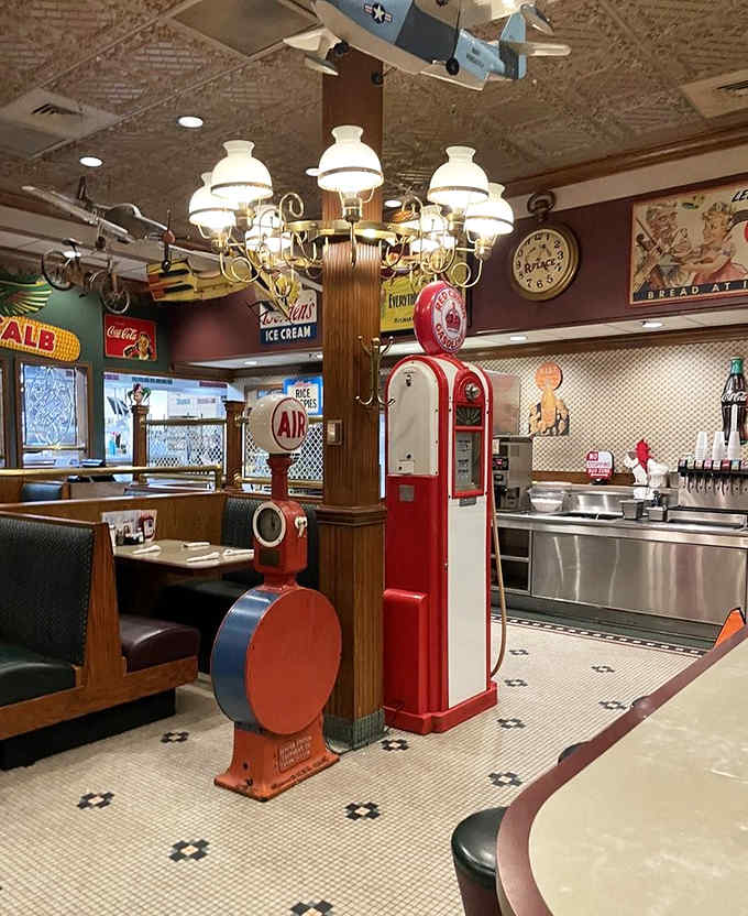 The retro interior of RPlace features classic gas station pumps, hanging bicycles, and all the charm of a roadside diner from America's golden age.