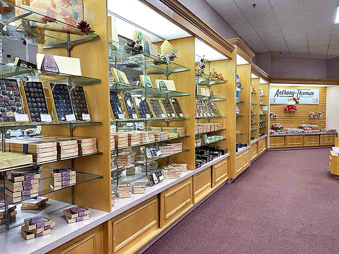 Shelf after glorious shelf of boxed chocolates line the walls, promising sweet adventures for every palate and preference.