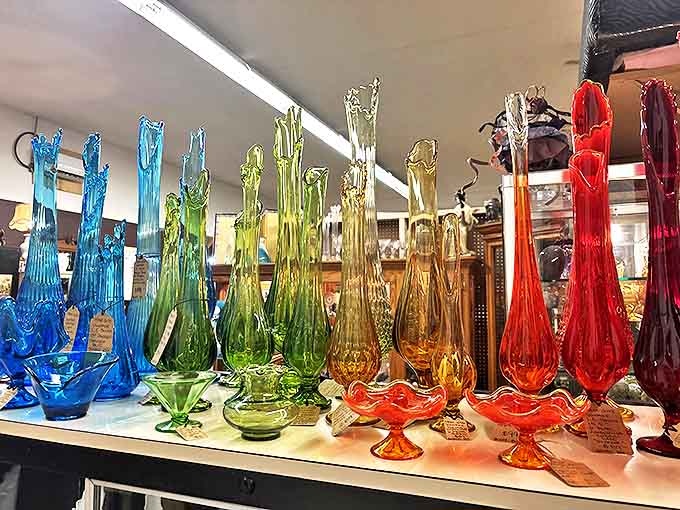 These vibrant vintage glass swizzle sticks and candy dishes create a rainbow of nostalgia that would make any mid-century cocktail party shine.