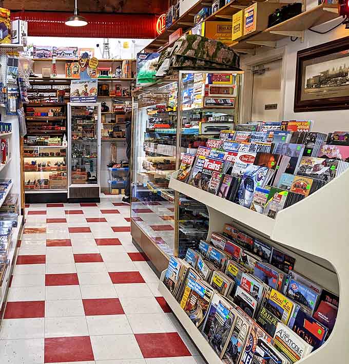 Vintage train magazines and detailed displays showcase the serious side of this delightful hobby, knowledge waiting to be absorbed.