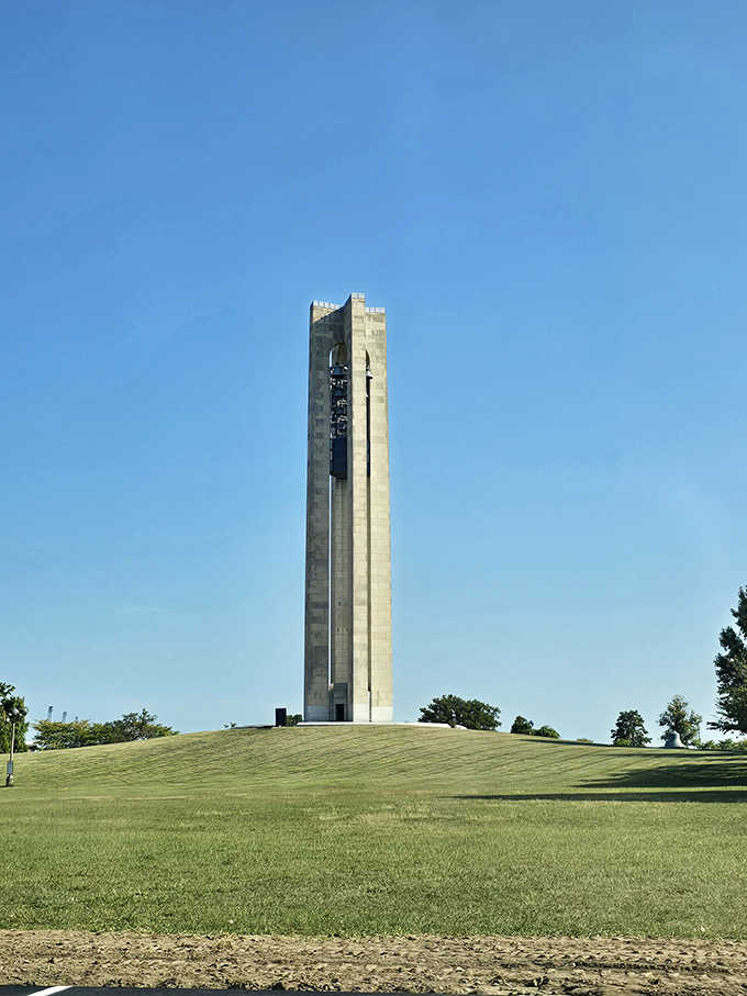 The Carillon Tower commands attention from every angle, standing proudly atop its grassy hill like a limestone sentinel guarding Dayton's remarkable past.