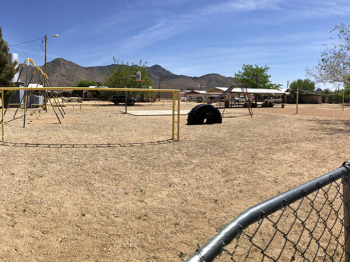 The community park might be modest, but there's something wonderfully nostalgic about these sun-baked swings waiting for the next generation of desert explorers.