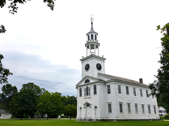 The iconic white church with its soaring steeple has witnessed generations of Poultney life, standing as a beacon of community continuity.