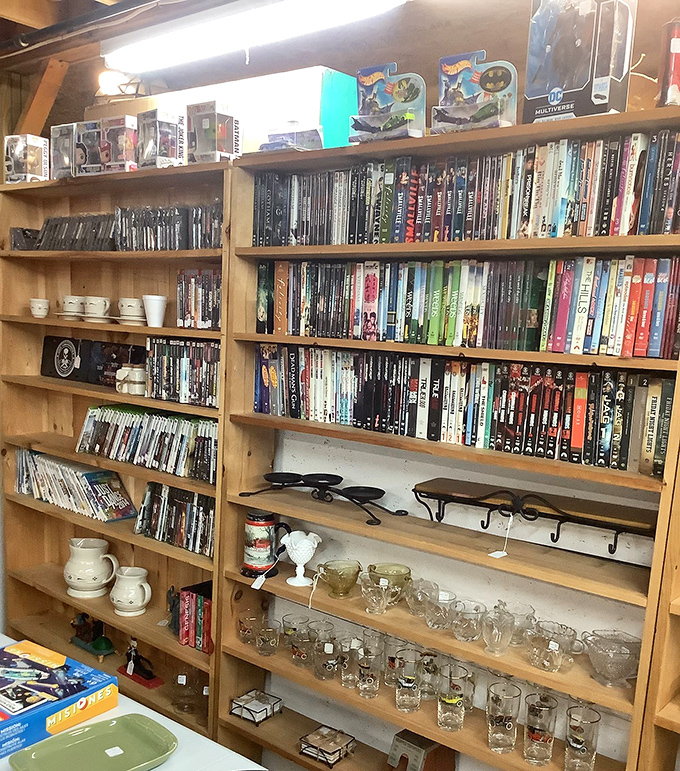 From classic films to delicate glassware, this corner booth showcases the delightful diversity that makes antiquing an adventure.