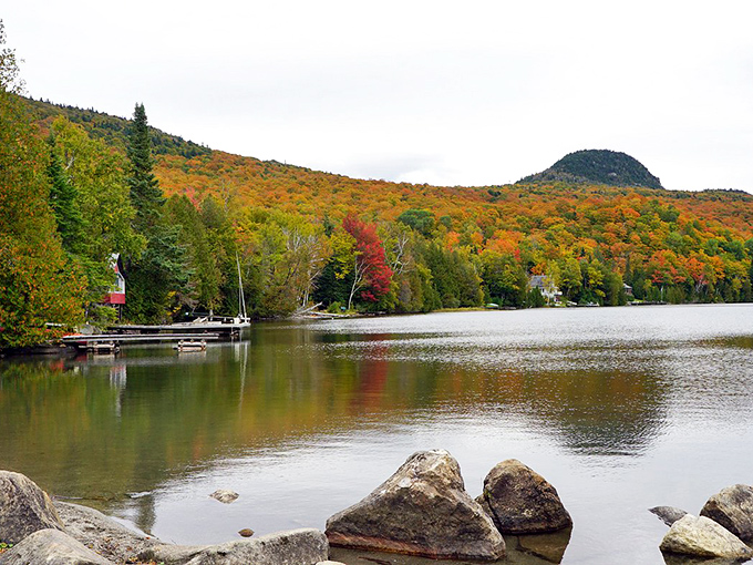 Nature's autumn masterclass &ndash; when fall foliage peaks around Willoughby, the mountains become a tapestry of impossible colors reflected in mirror-like waters.