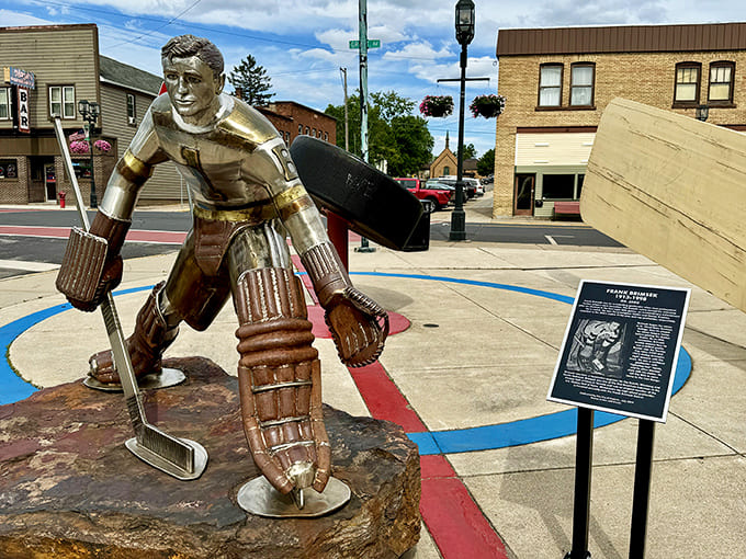 Frank Brimsek stands frozen in bronze, eternally ready to make the save. "Mr. Zero" watches over his hometown with the same intensity that made him legendary.