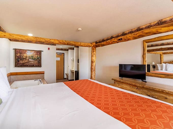Guest rooms feature rustic touches and comfortable beds where exhausted swimmers can collapse after conquering every slide in the waterpark.