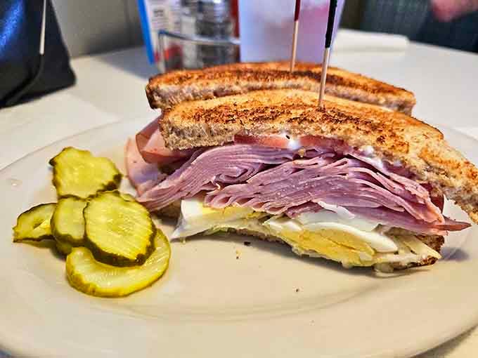 This isn't just any sandwich &ndash; it's architectural genius with layers of ham stacked so perfectly you'd think engineers were involved.