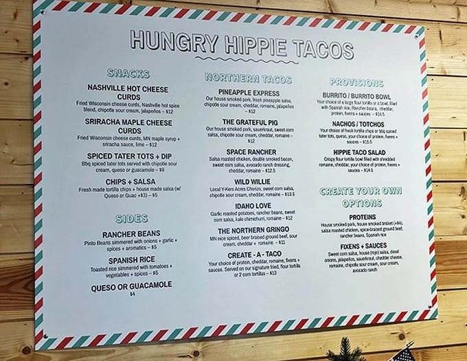 The holy scripture of Hungry Hippie Tacos &ndash; a menu board that promises culinary adventures ranging from "The Grateful Pig" to "Space Rancher" with equal enthusiasm.