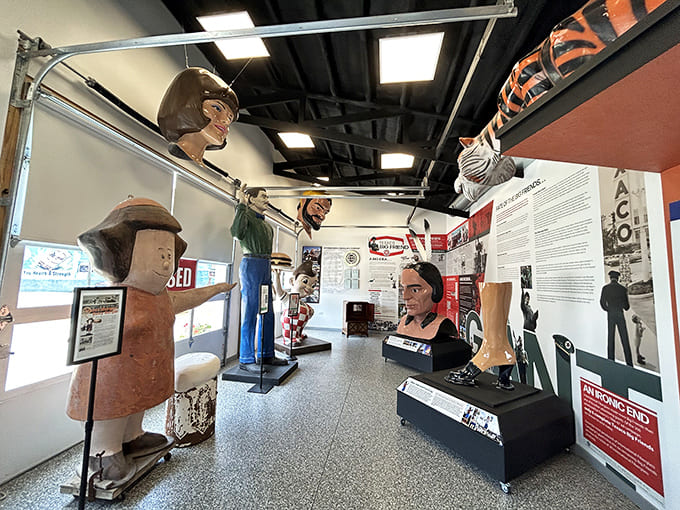 Inside, fiberglass giants tower over visitors, their frozen expressions telling tales of America's love affair with the oversized and outlandish.