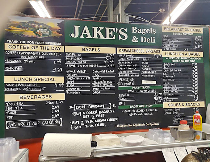 The menu board displays a dizzying array of bagel and cream cheese options, like a choose-your-own-adventure book for carb lovers.