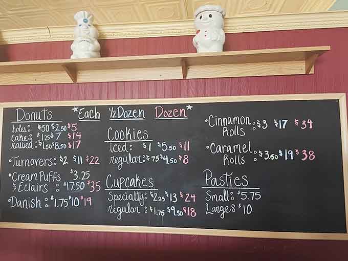 That chalkboard menu holds the keys to carb-loaded happiness, from turnovers to Danish to cinnamon rolls that require architectural support.