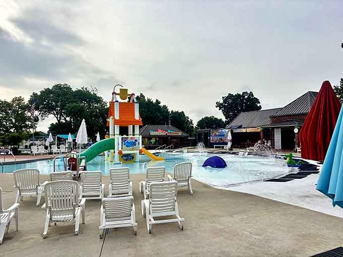 The kiddie pool area features a whimsical playhouse with slides that transform timid toddlers into confident little water warriors within minutes.