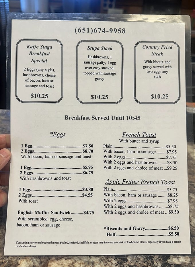 A symphony of comfort classics awaits on this no-nonsense menu, where breakfast reigns supreme and gravy flows like liquid gold.