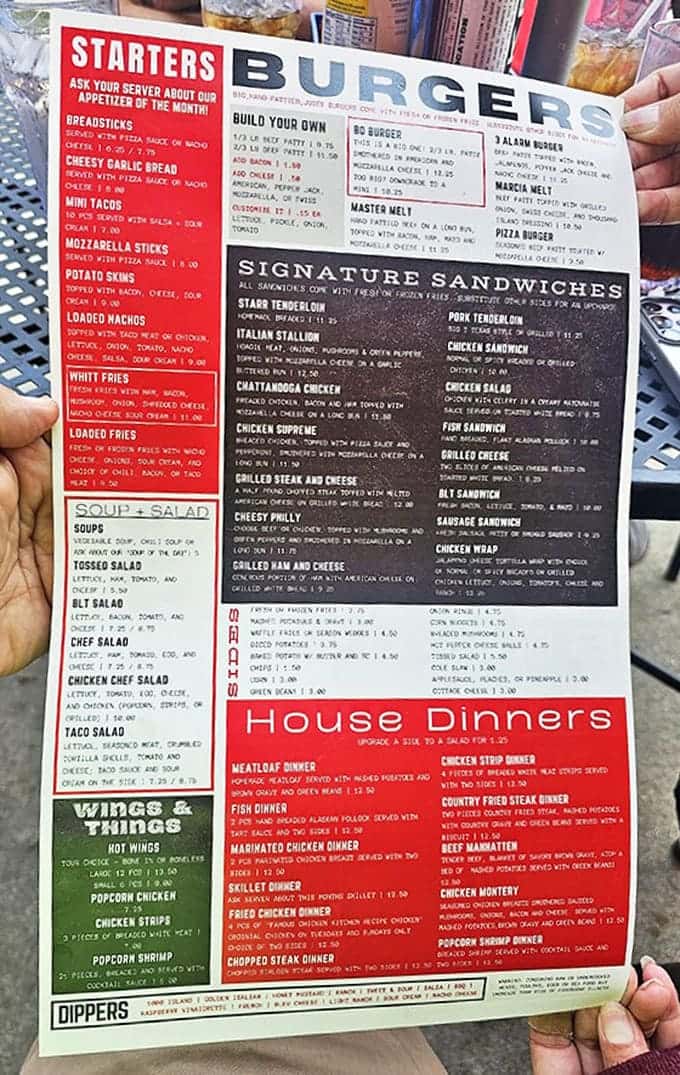 The menu reads like a love letter to American comfort food, with everything from loaded nachos to country-fried steak tempting hungry diners.