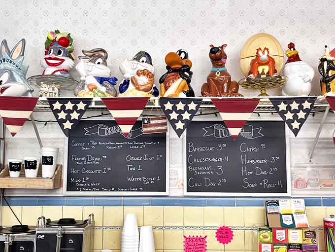 Cookie jars with googly eyes stand guard over a menu board that promises simple pleasures at refreshingly reasonable prices.