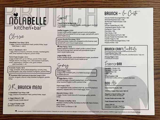 This menu reads like a greatest hits album of comfort food elevated to art, featuring everything from waffles to pork belly that'll haunt your dreams.