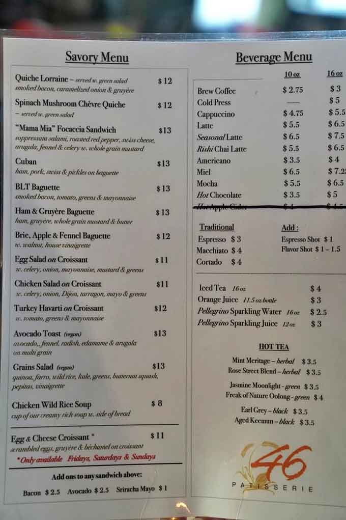 The menu reads like a love letter to French cuisine, with savory quiches and sandwiches competing for attention alongside sweet masterpieces.