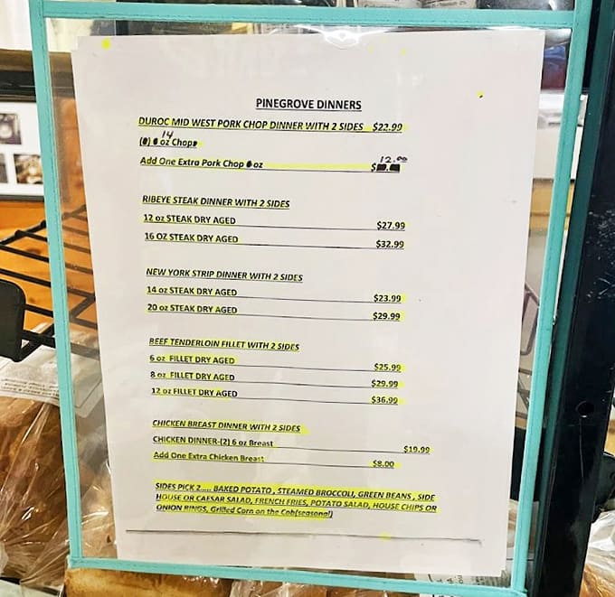 A lineup of carnivore's dreams where every item competes for your attention, but regulars know the Greek burger reigns supreme.