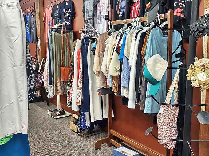 Racks of vintage clothing await new life, from delicate lace pieces to bold patterns that defined their eras.