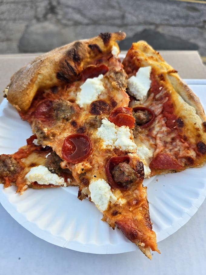 Ricotta slices that make you question everything you thought you knew about pizza &ndash; crispy-edged crust supporting clouds of cheese and savory toppings.