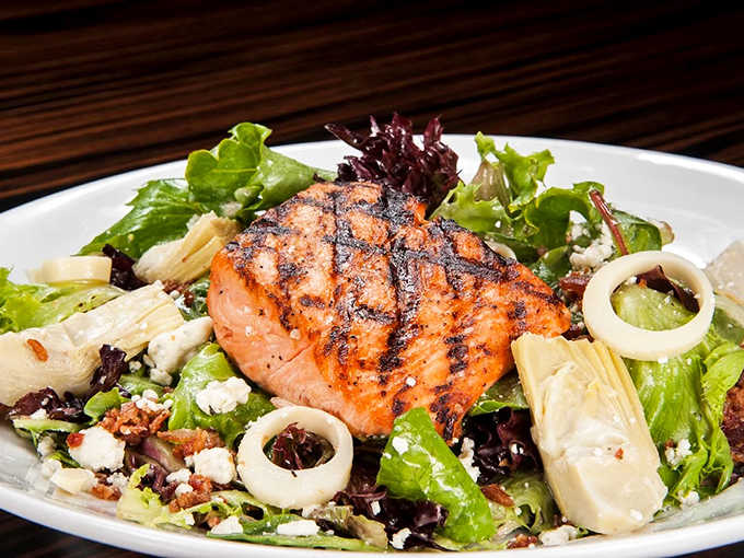 This salmon salad isn't just lunch &ndash; it's artwork on a plate, with perfectly grilled fish playing centerpiece to a symphony of greens.