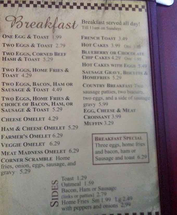 This menu reads like a love letter to breakfast, offering everything from simple eggs to the gloriously named Meat Madness Omelet.