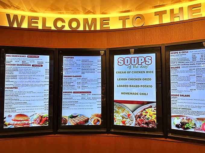 The illuminated menu boards showcase a mouthwatering lineup that might cause temporary decision paralysis &ndash; a delicious dilemma indeed.