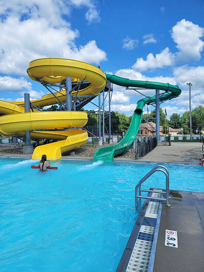Yellow meets green in this twisting tale of two slides. One's a gentle journey, the other's for those who enjoy leaving their stomach behind.