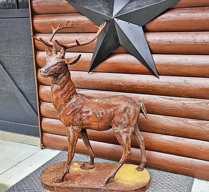 This wooden deer has seen some things, survived some things, and now waits patiently for someone who appreciates character over perfection.