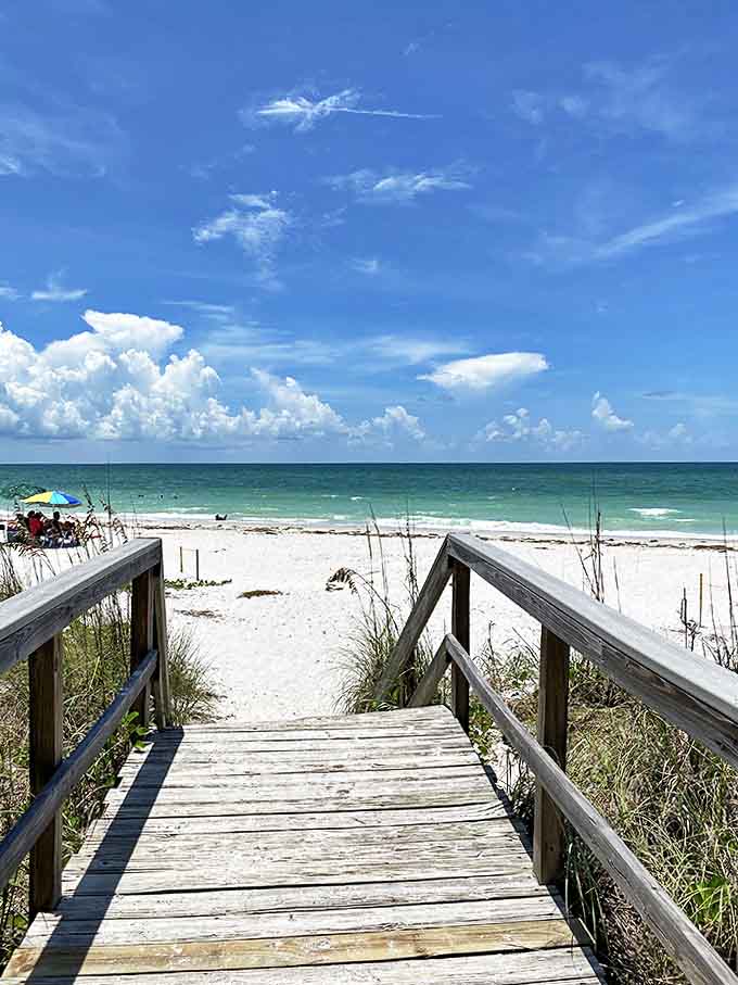 This weathered boardwalk isn't just a path to the beach&mdash;it's a portal to your stress-free alternate universe.