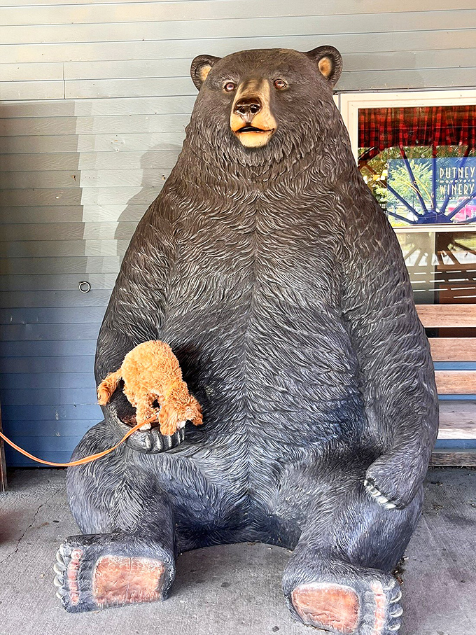 This imposing bear statue guards a collection of Vermont memorabilia, silently judging your restraint as you reach for your wallet.