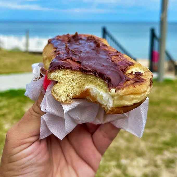 That moment when chocolate meets cream filling &ndash; these donuts aren't just eaten, they're experienced, one blissful bite at a time.